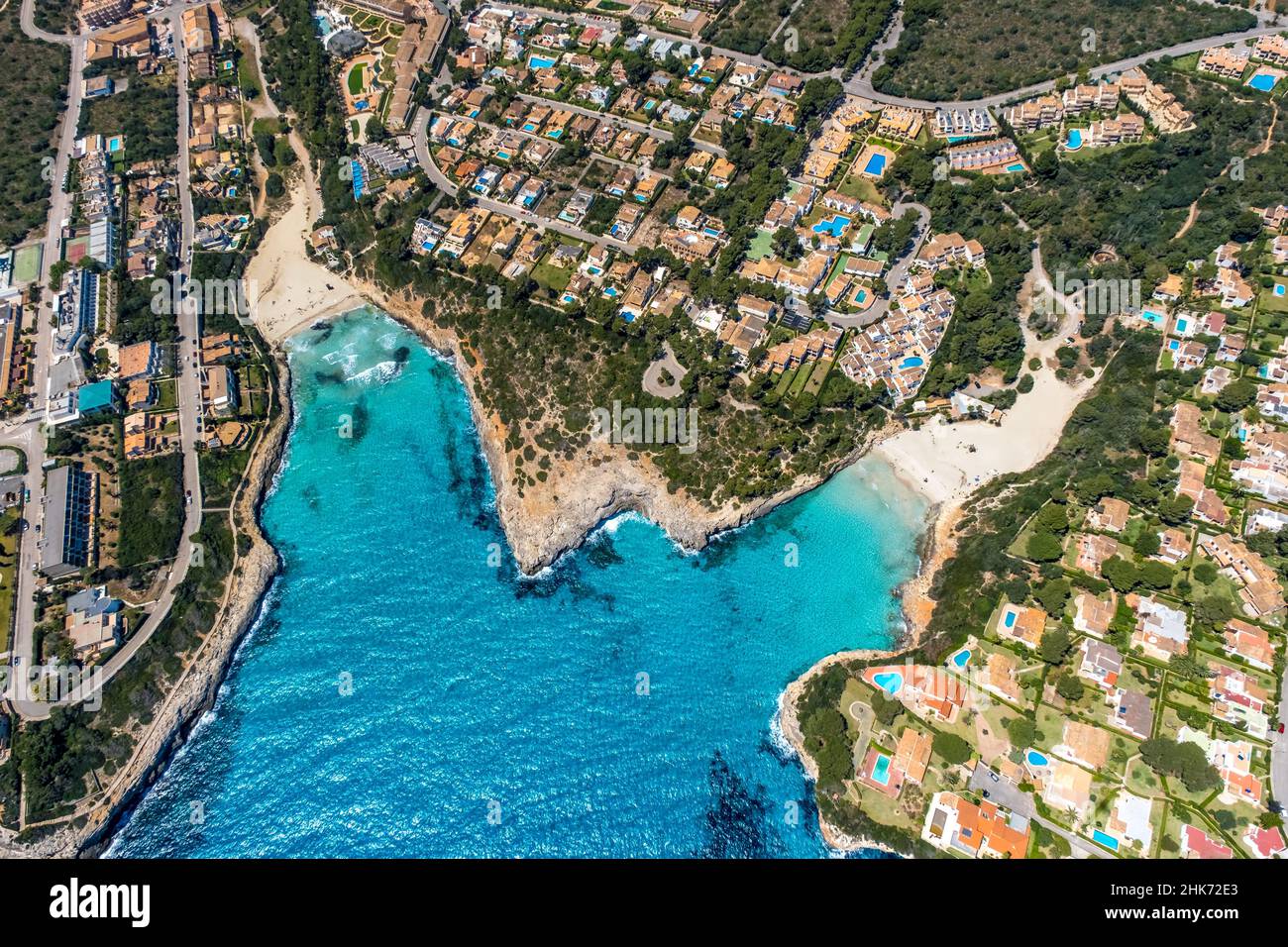 Aerial view, Cala Anguila bay with beach Playa de Cala Mandia and beach ...
