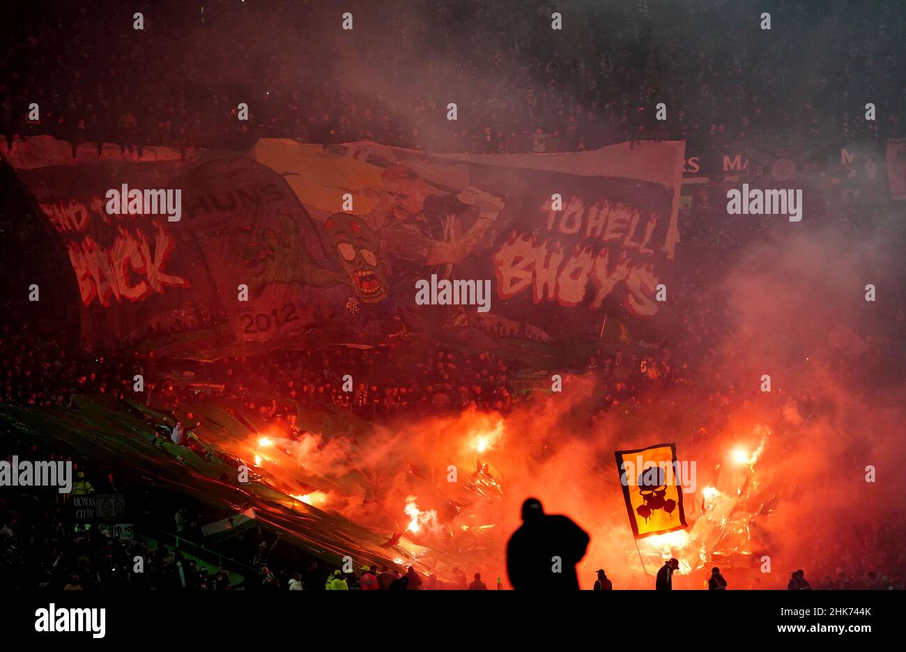 Celtic fans light flares in the stands during the cinch Premiership ...