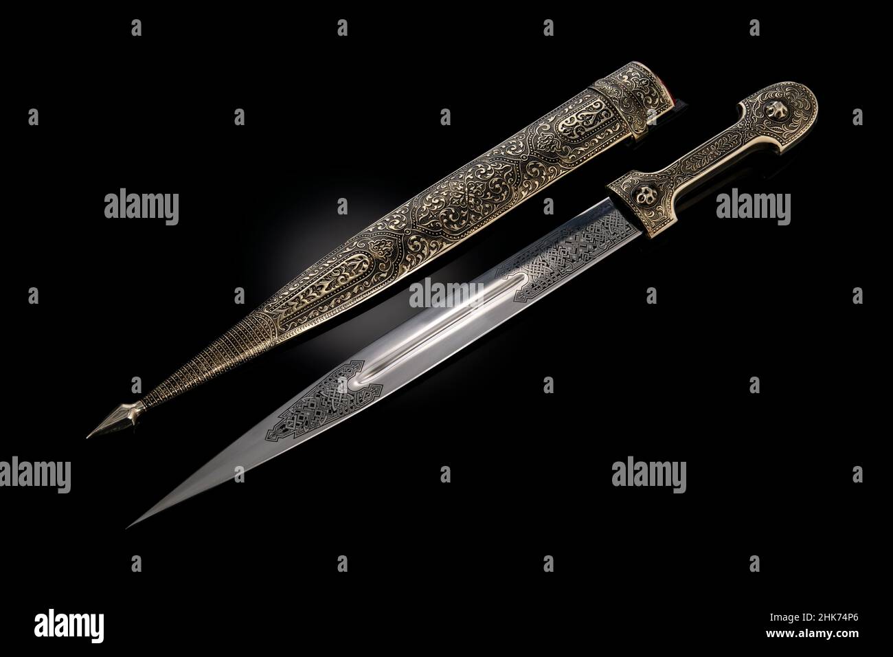 souvenir collectible silver dagger with scabbard on black. Luxury ...