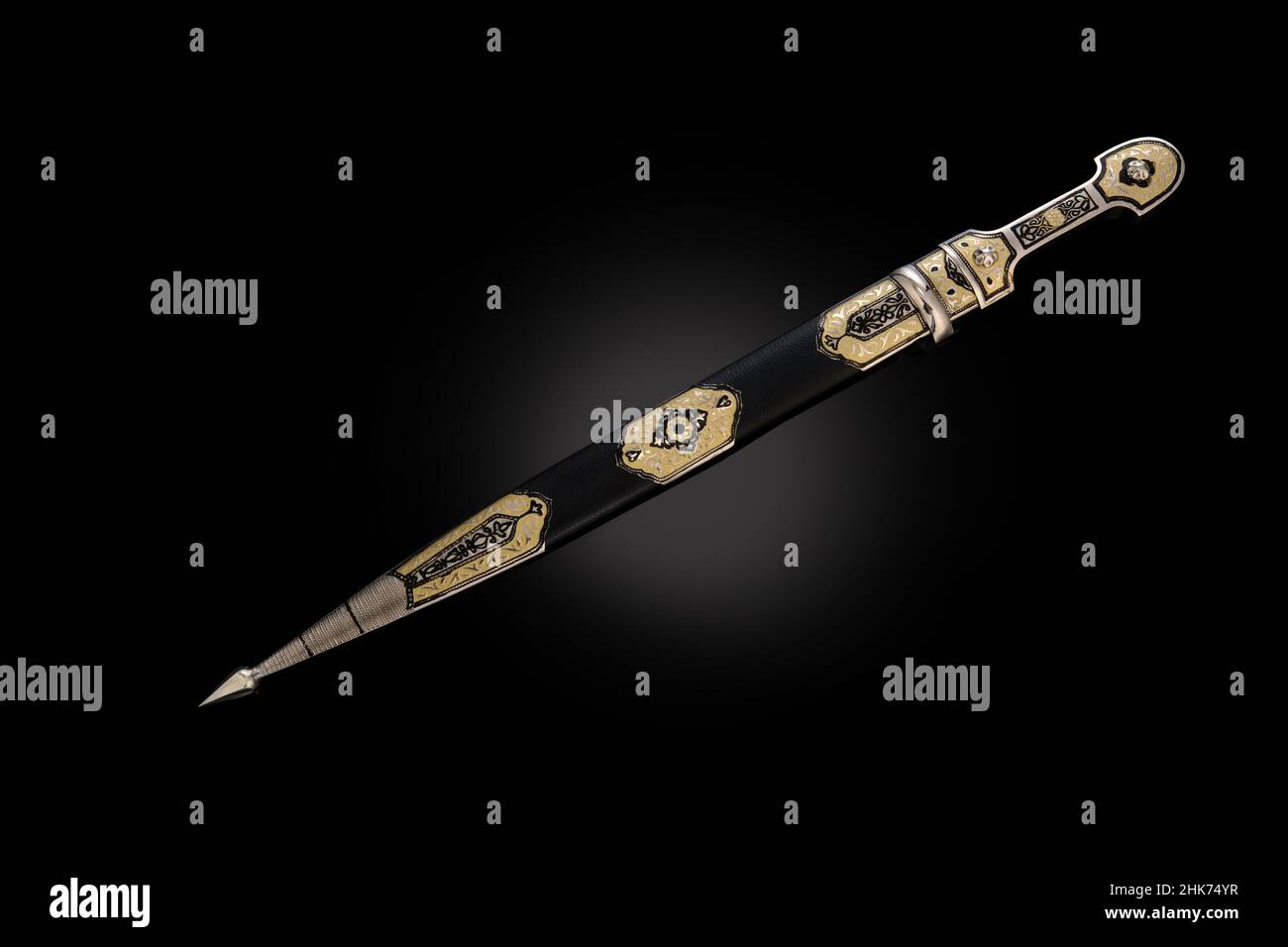 souvenir collectible silver dagger with scabbard on black. Luxury ...