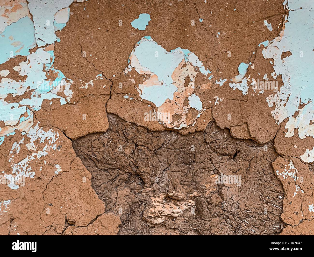 Textured plaster background. Terracotta brown with blue lime Stock ...