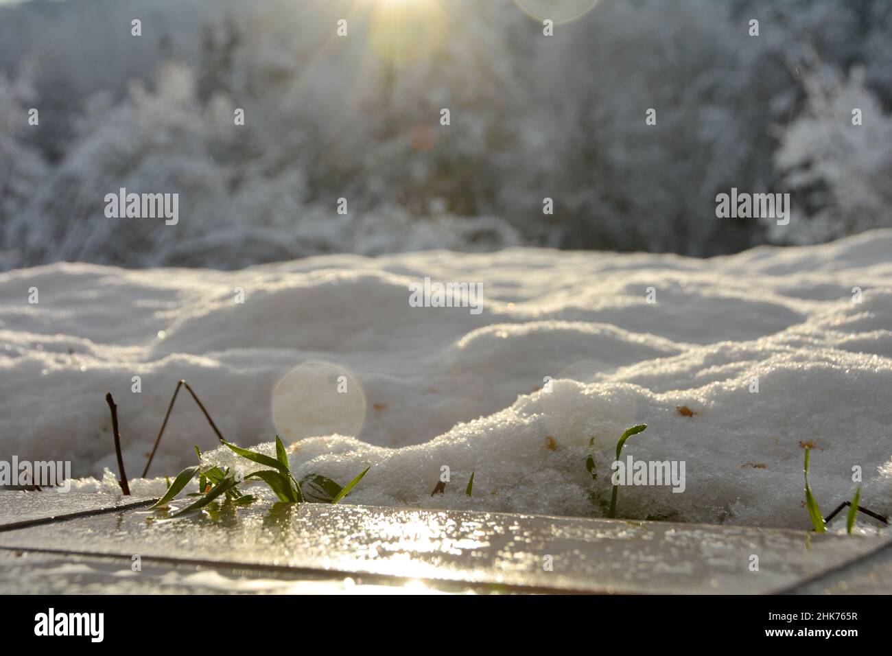 Terrace with a lot of deep snow in the early morning with sunrays Stock ...