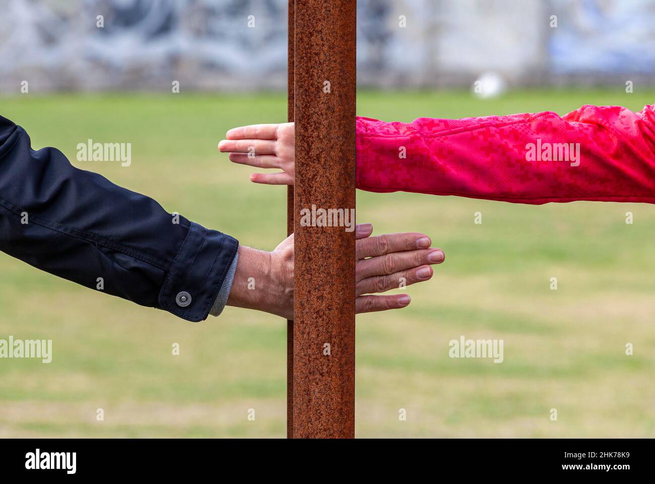Symbolic image border, social distance, friendly handshake between ...