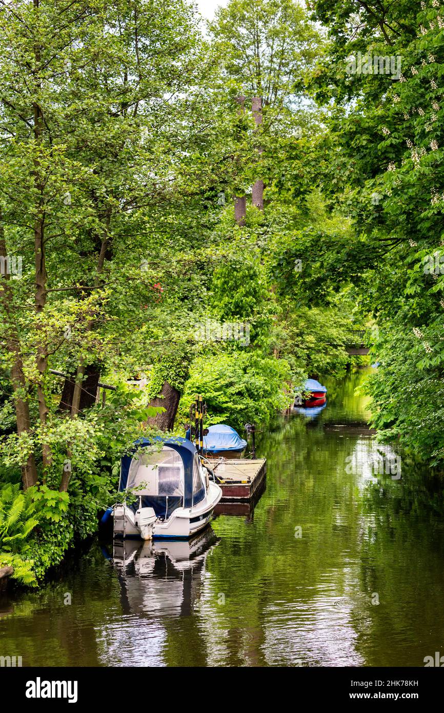 Small water canal with boat landing stage, Berlin, Germany Stock Photo ...