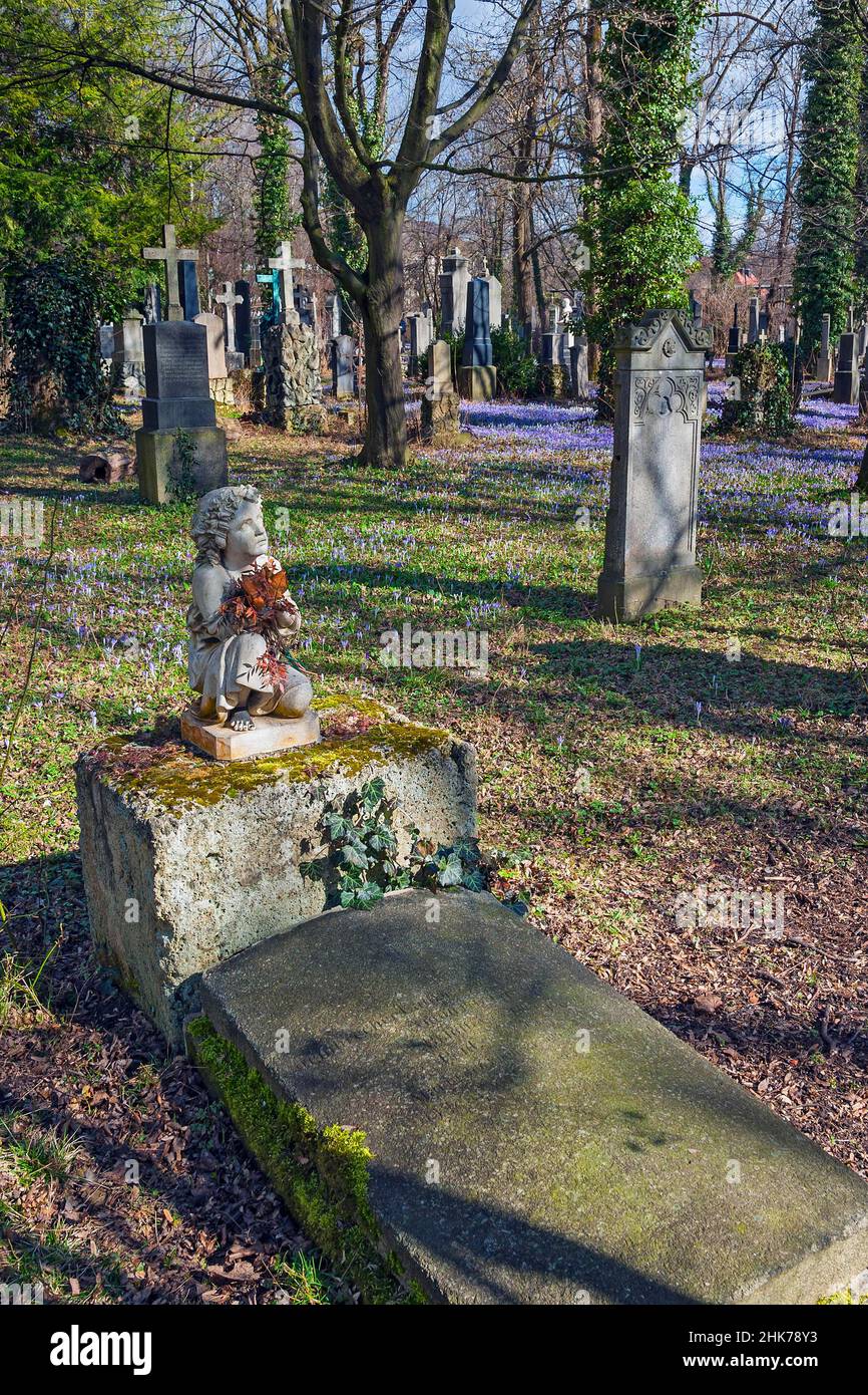 South cemetery with childlike figure on gravestone, Munich, Bavaria ...