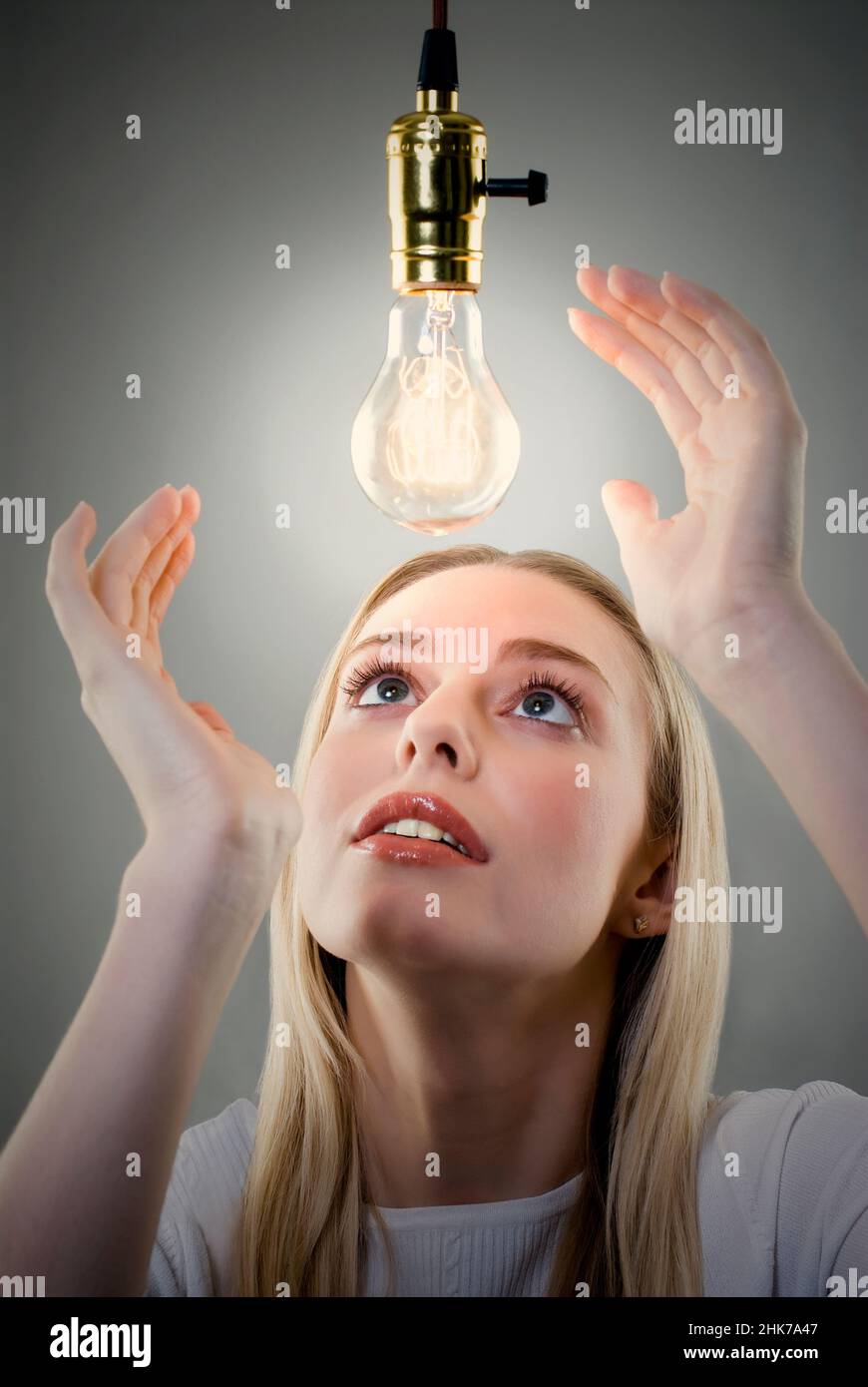 Woman head light bulb idea hi-res stock photography and images - Alamy