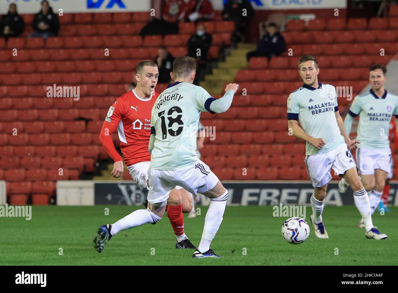 Josh Benson #10 of Barnsley plays a through ball Stock Photo - Alamy