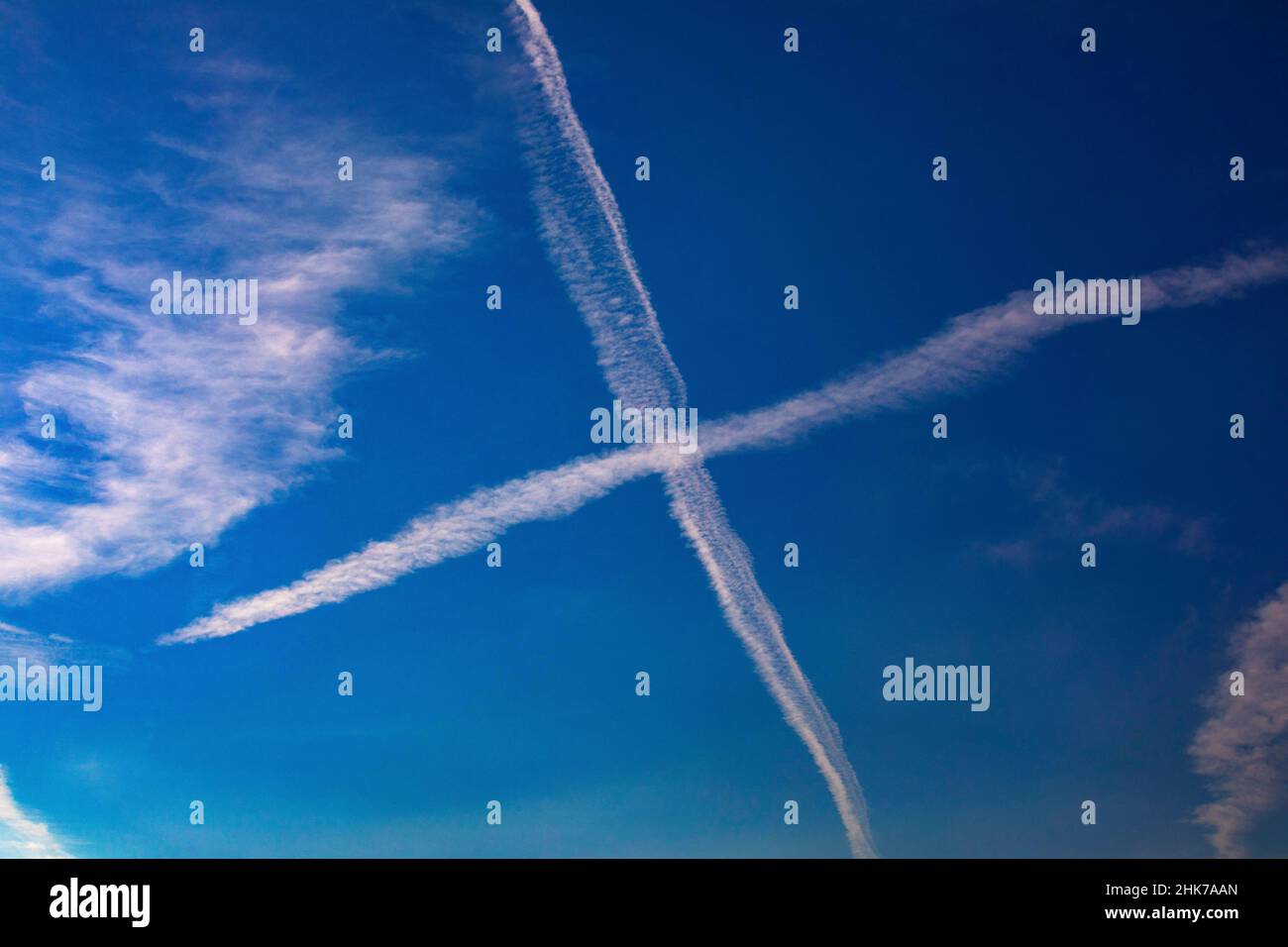 Cloudy sky with condensation trails, Austria Stock Photo - Alamy
