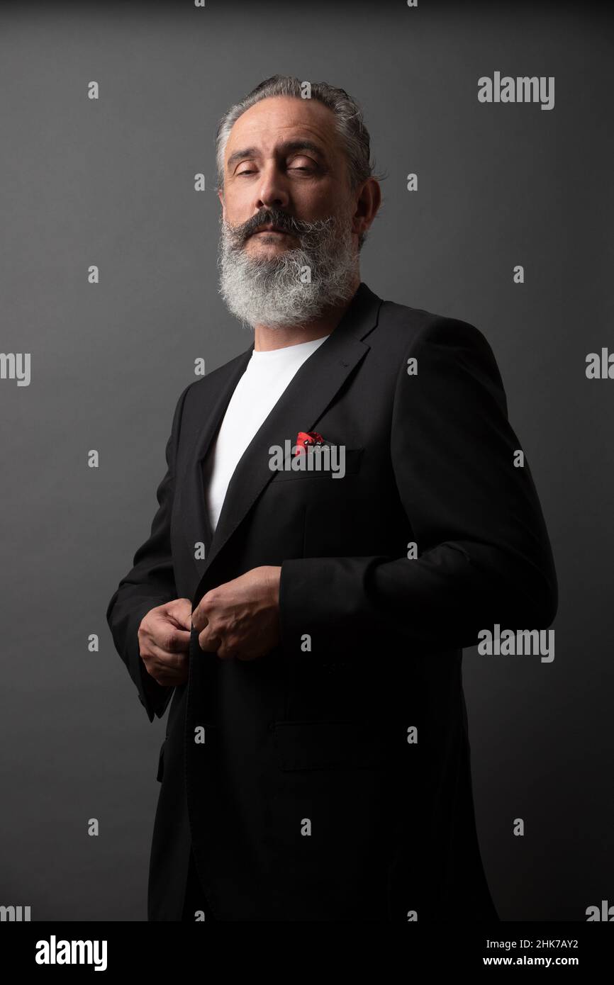 Elegant dressed suit hi-res stock photography and images - Alamy