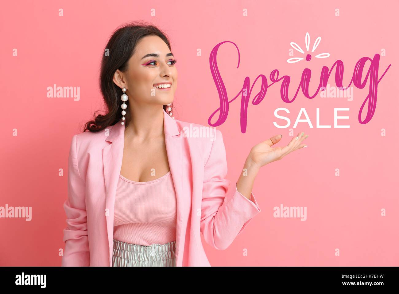 Beautiful woman on color background. Spring sale Stock Photo - Alamy
