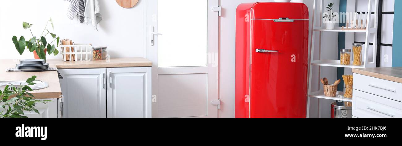 Interior of modern kitchen with stylish red refrigerator Stock Photo ...