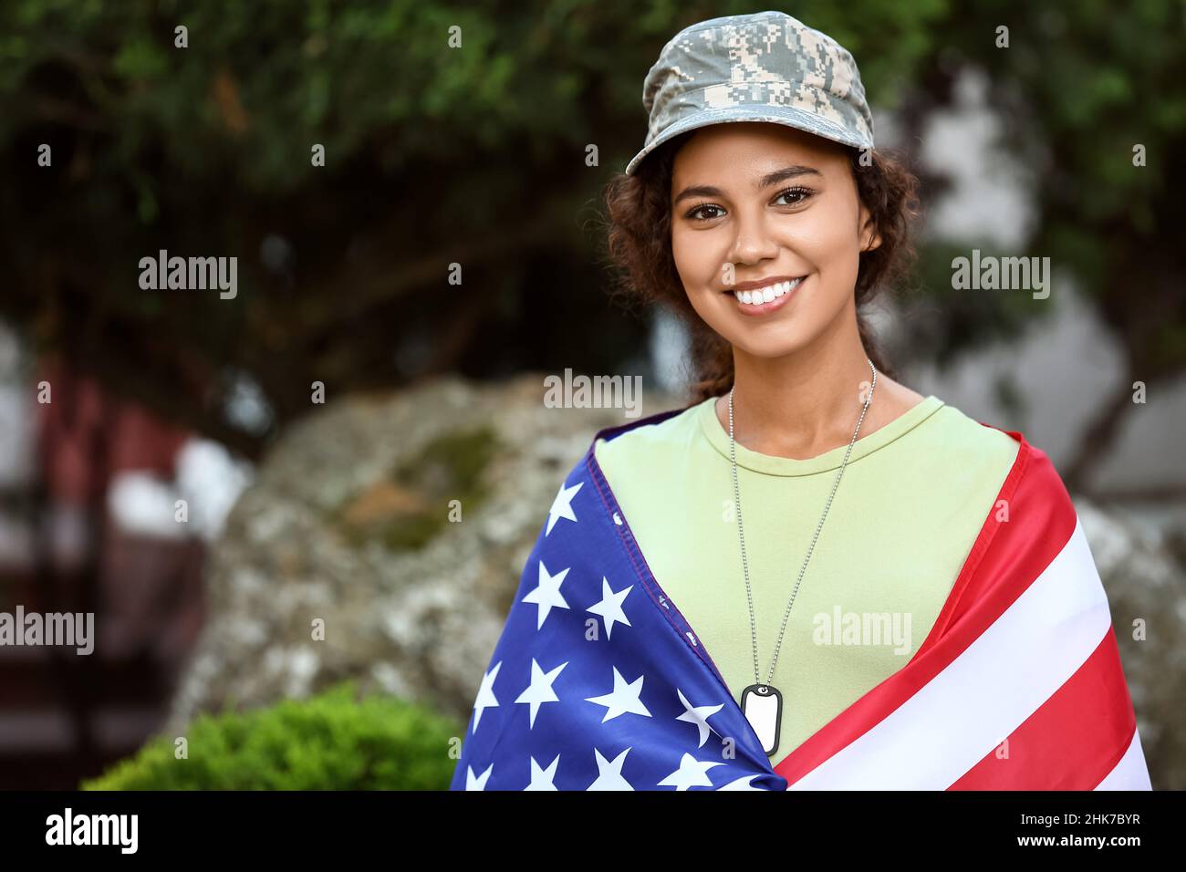 African-American female soldier with USA flag outdoors Stock Photo - Alamy