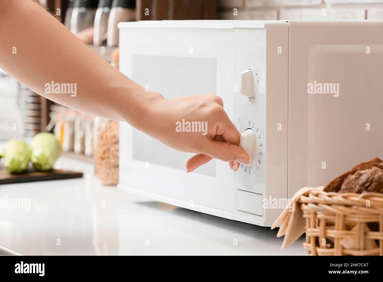 Using microwave oven hi-res stock photography and images - Alamy