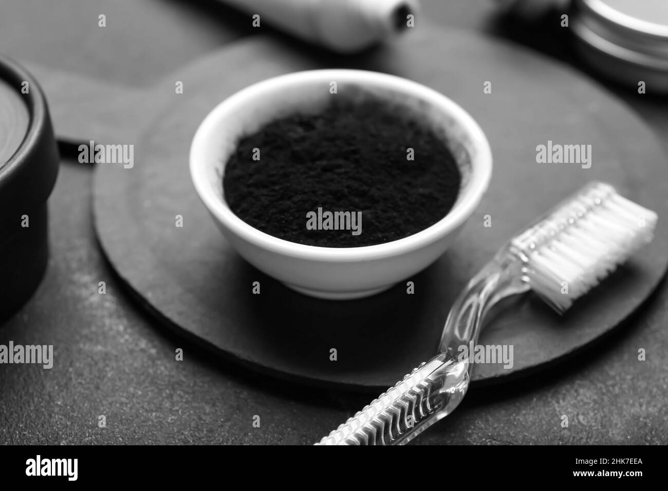 Charcoal powder teeth Black and White Stock Photos & Images - Alamy