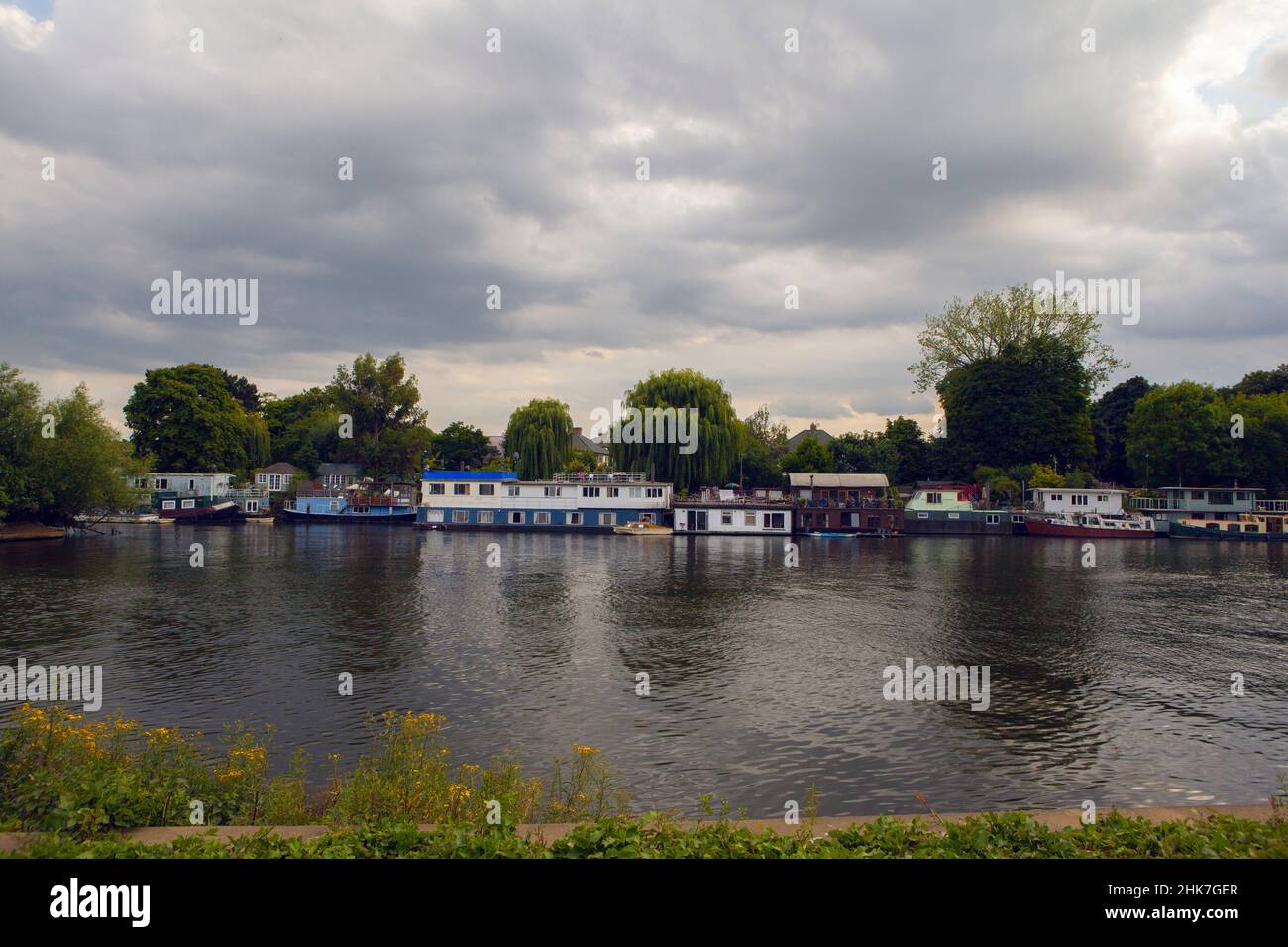ness riverside view in inverness with houses and boats Stock Photo - Alamy