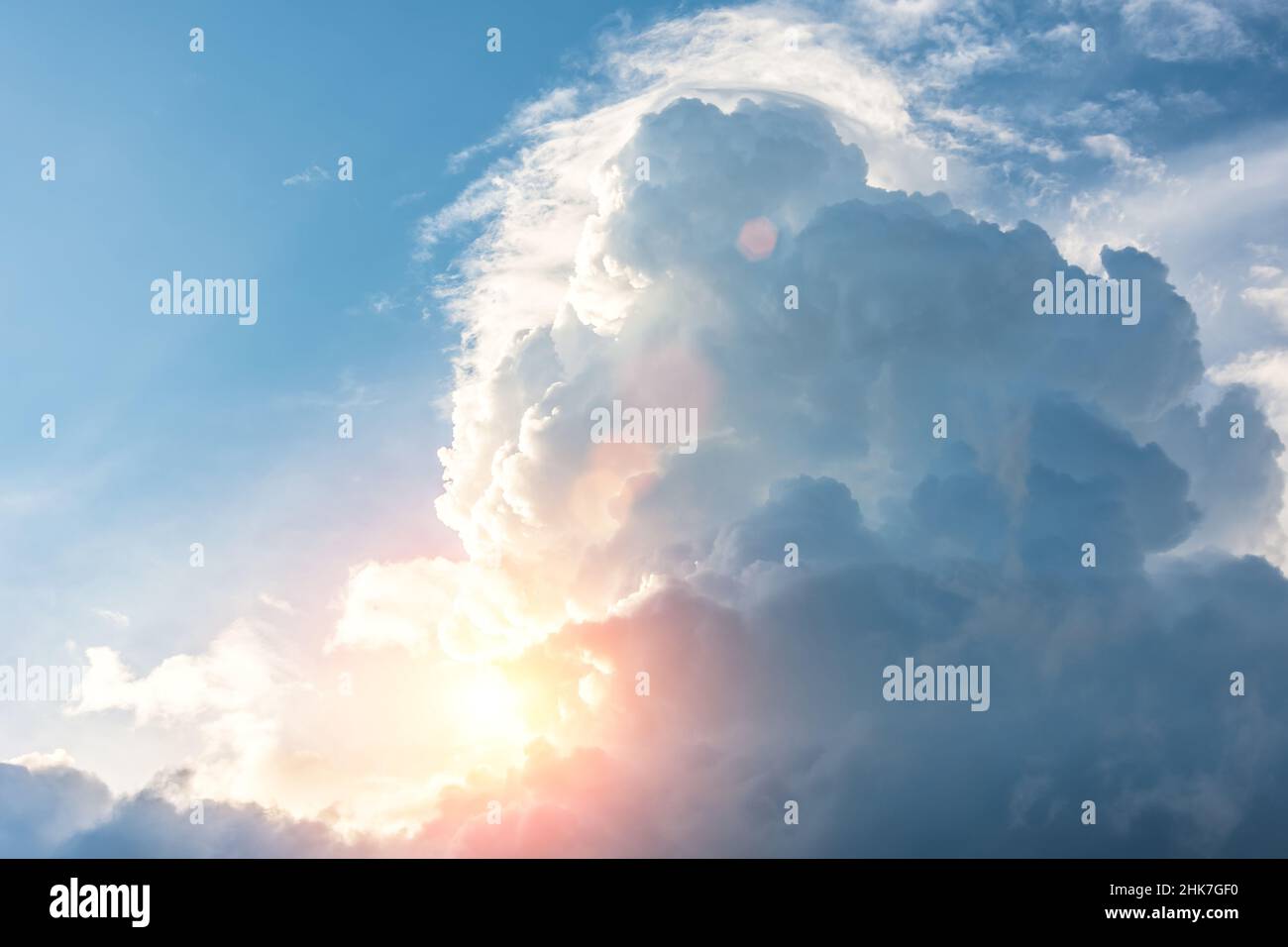 Sun shines through rain clouds hi-res stock photography and images - Alamy