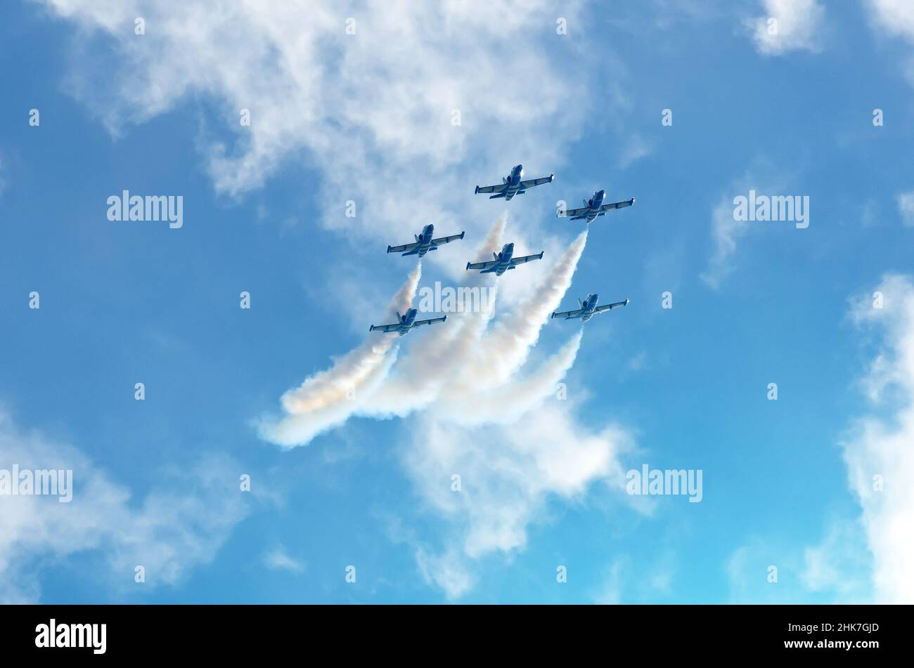 Aircraft fighter jets smoke the background of sky and sun Stock Photo ...