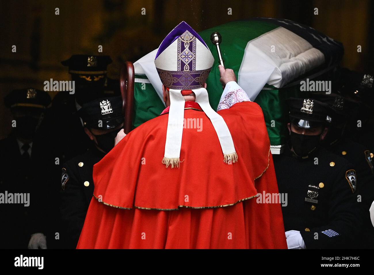 Cardinal Timothy Dolan blesses the casket of NYPD of Wilbert Mora ...