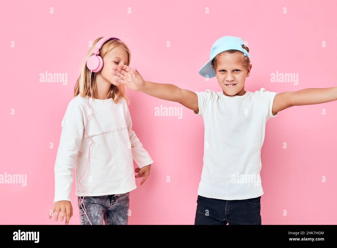 young people dancing entertainment pink color background Stock Photo ...