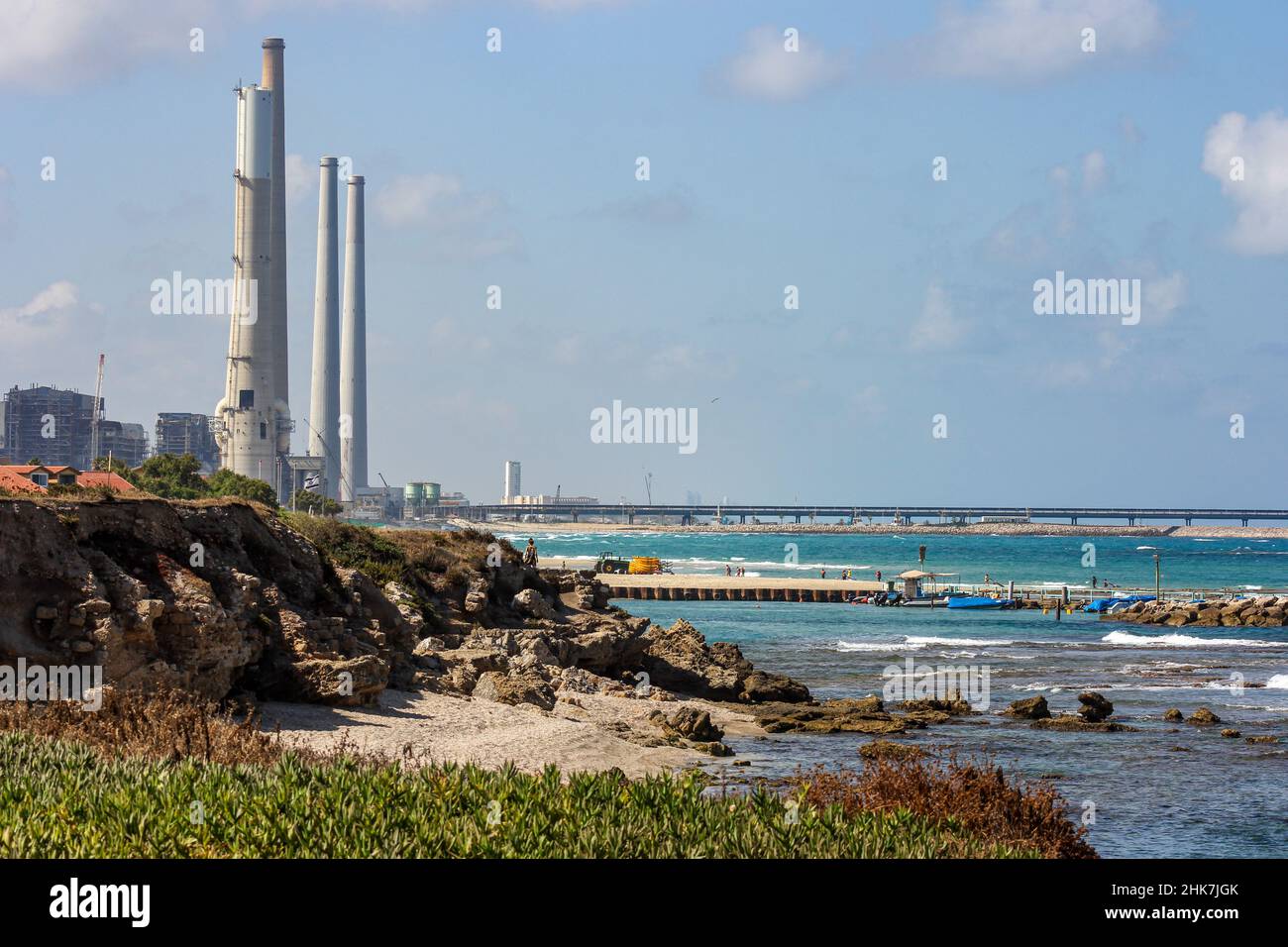 The towering smokestacks of the coal-fired Orot Rabin Power Plant along ...