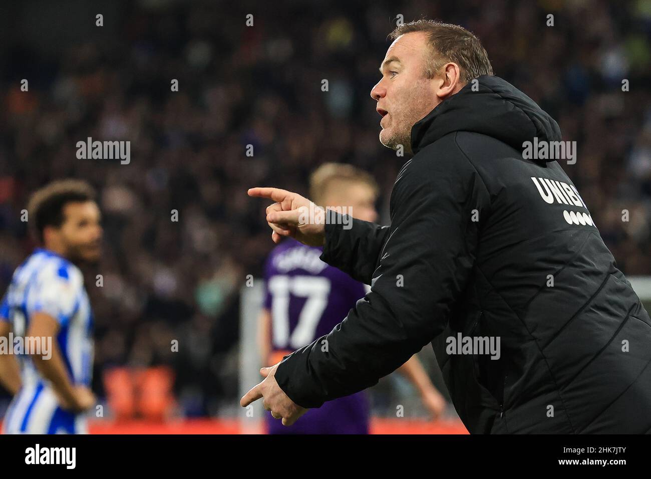 Wayne Rooney manager of Derby County gives his team instructions in, on ...