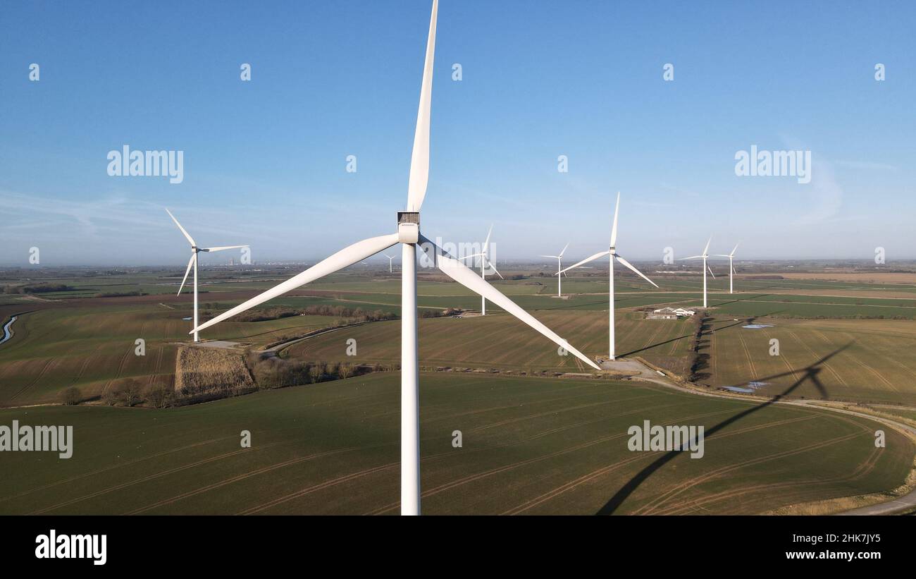 Wind Turbines sunny field Stock Photo - Alamy