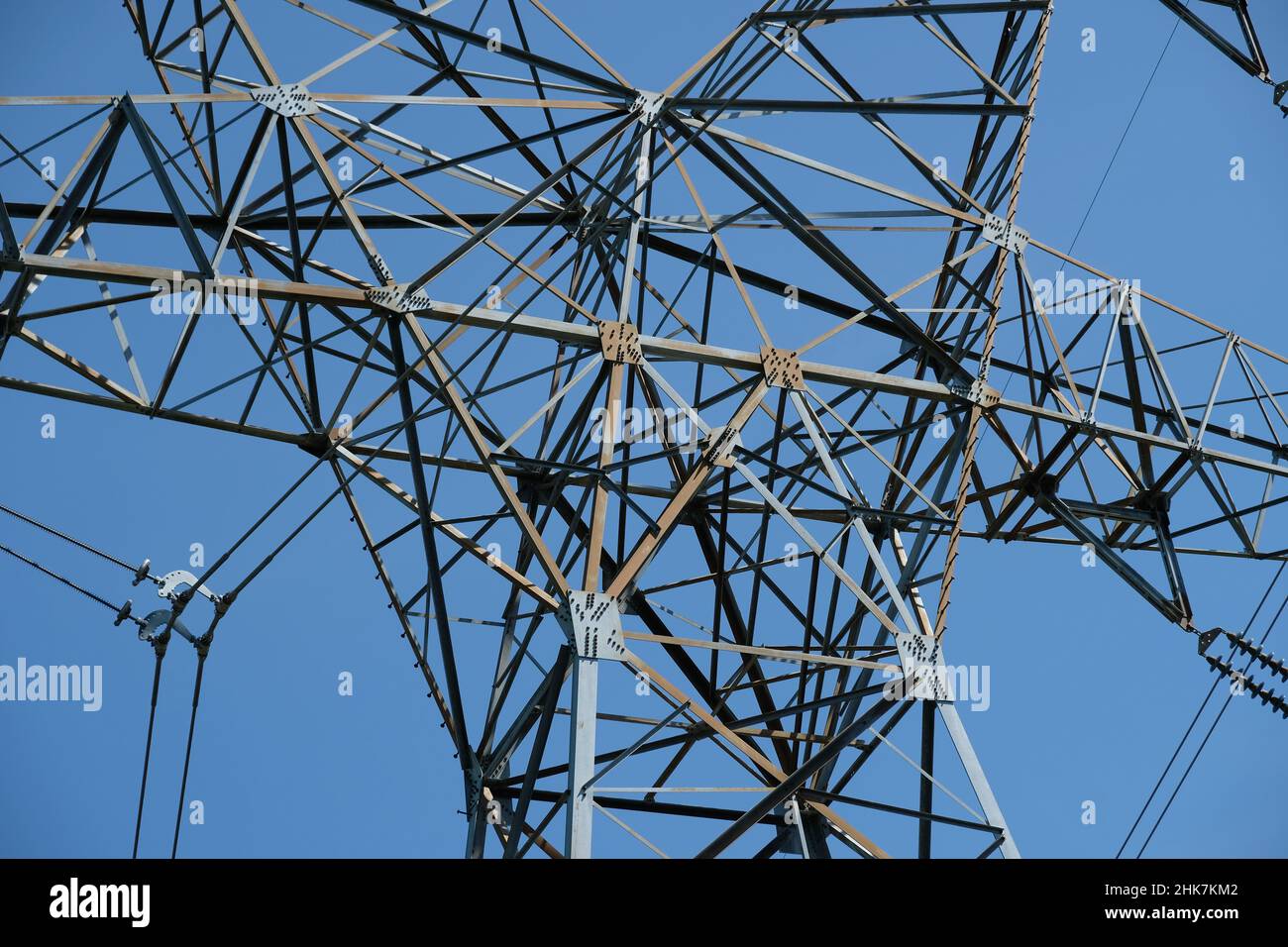 Metal tower electricity energy transmission bars bolts intersecting ...