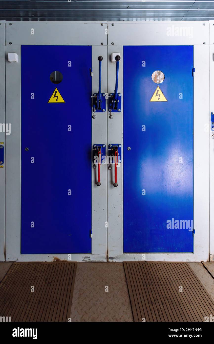 Transformer box. Locked metal doors of switchgear cabinets Stock Photo ...