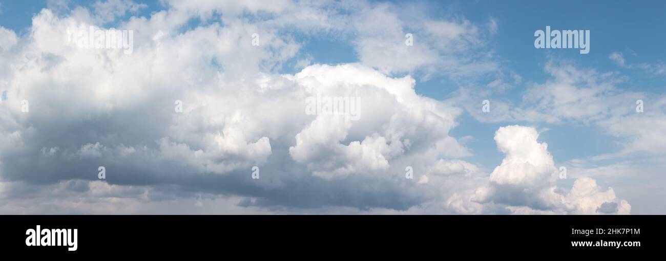 Air clouds in the blue sky. Nature background. Sunset sun. Warm evening ...