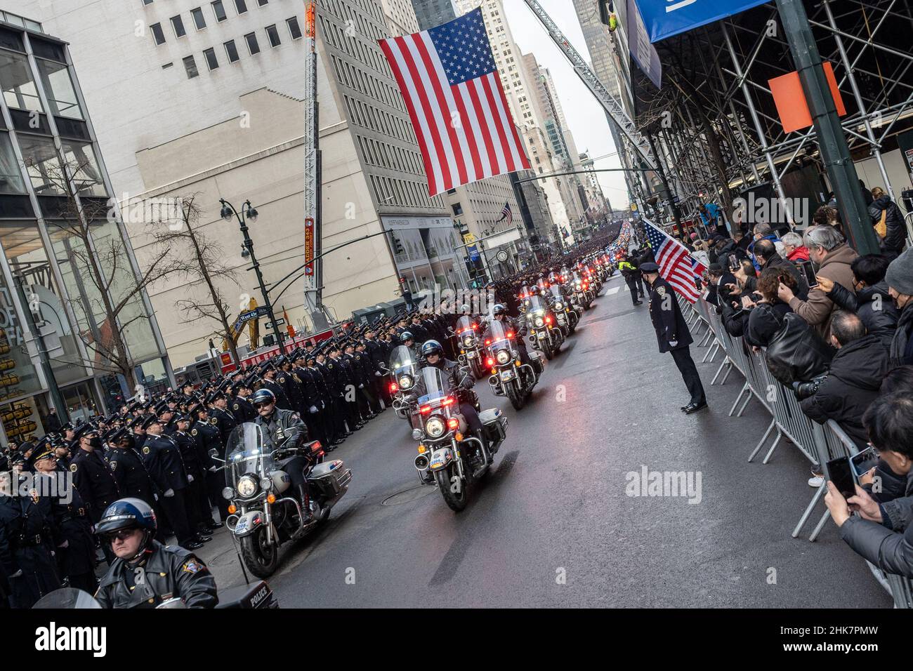 Motor units proceed the casket of NYPD Officer Wilbert Mora after his ...