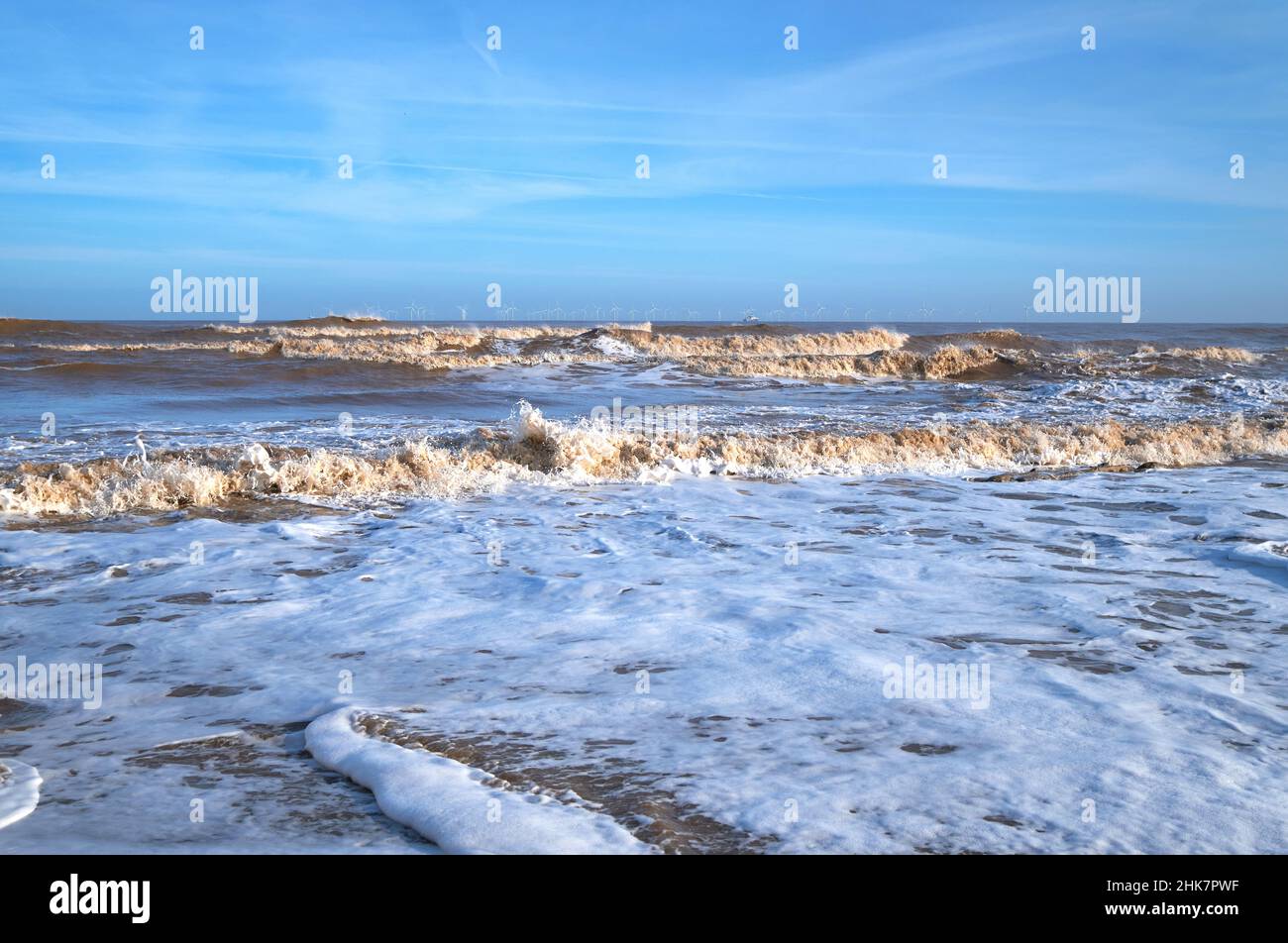 Gentle waves washing ashore Stock Photo - Alamy