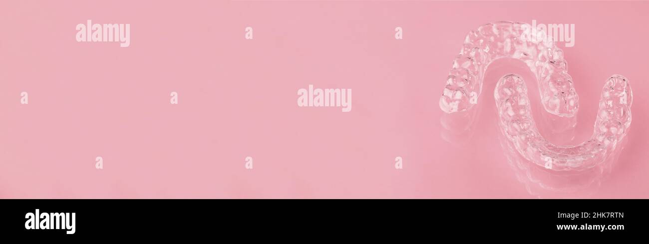 Banner with dental teeth aligners or invisible transparent plastic ...