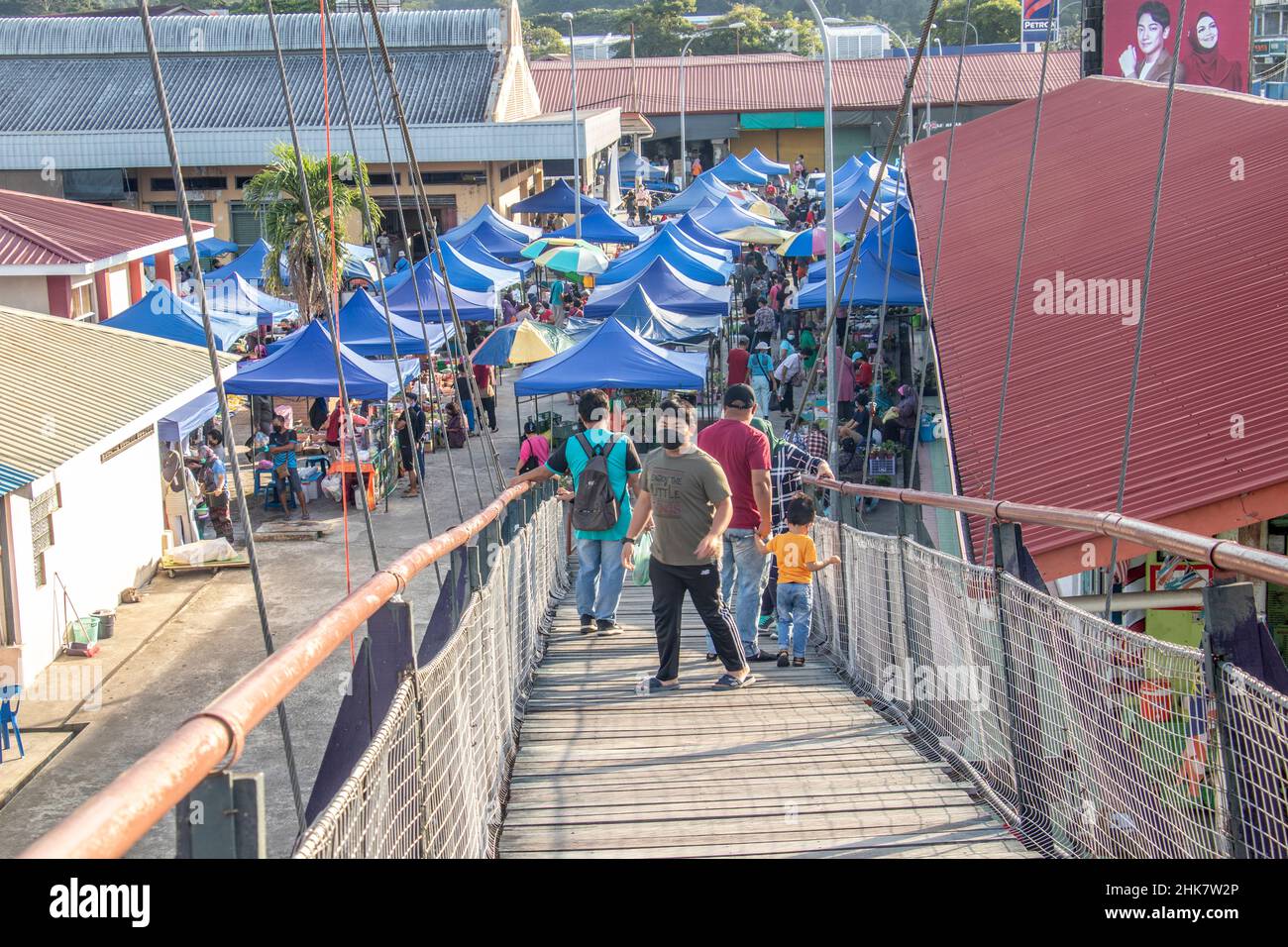 People on the Tamparuli bridge next to Tamparuli Wednesday Market Sabah ...
