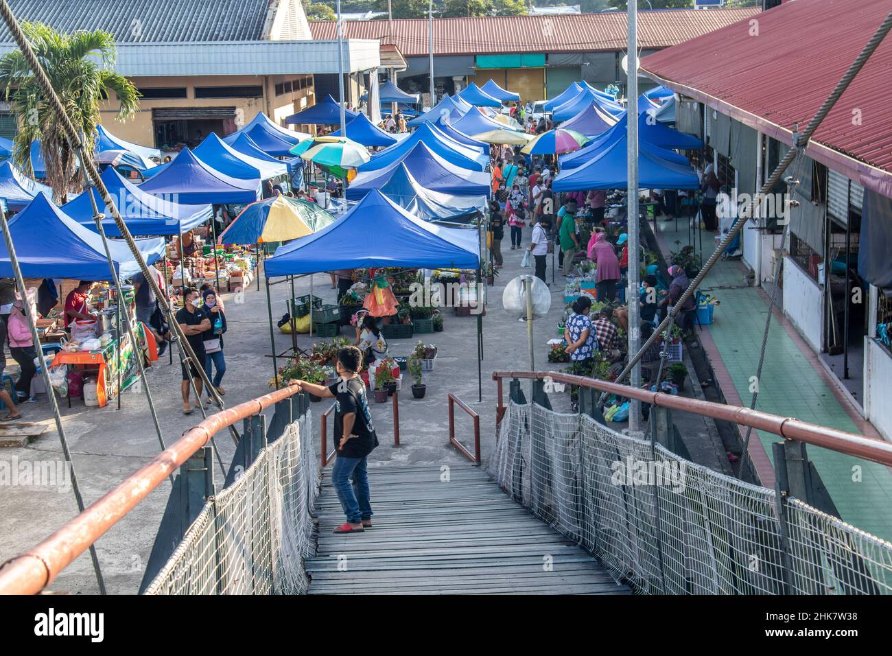 People on the Tamparuli bridge next to Tamparuli Wednesday Market Sabah ...