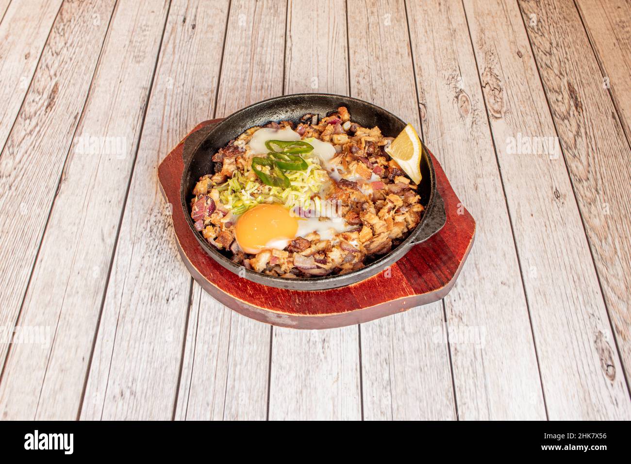 Sisig is a Filipino food of Pampanga origin. It is made with pig's head ...