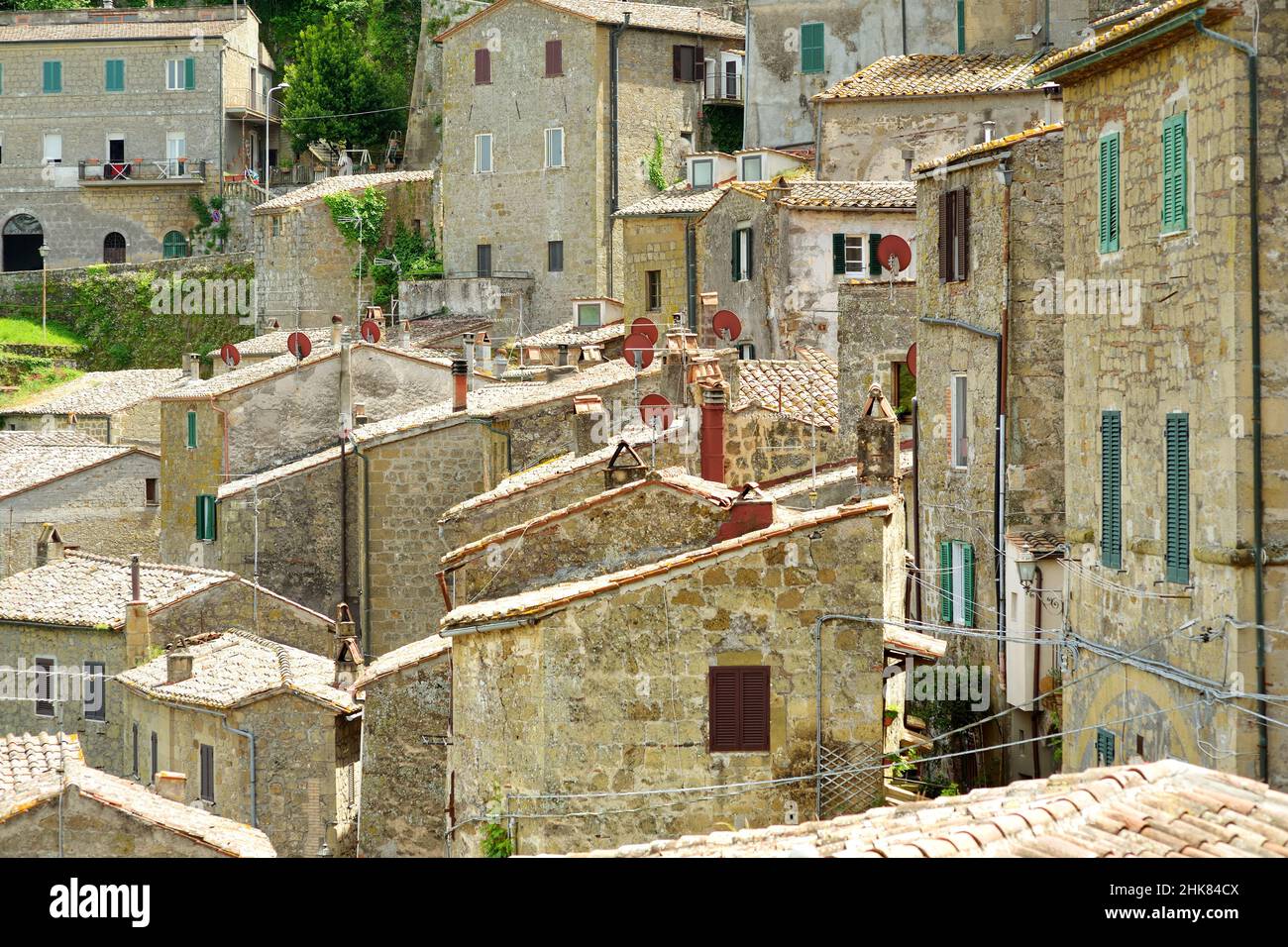 Rooftops of Sorano, an ancient medieval hill town hanging from a tuff ...