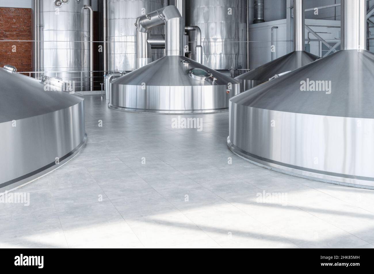 Large steel tanks for fermentation of beer drinks Industrial production ...