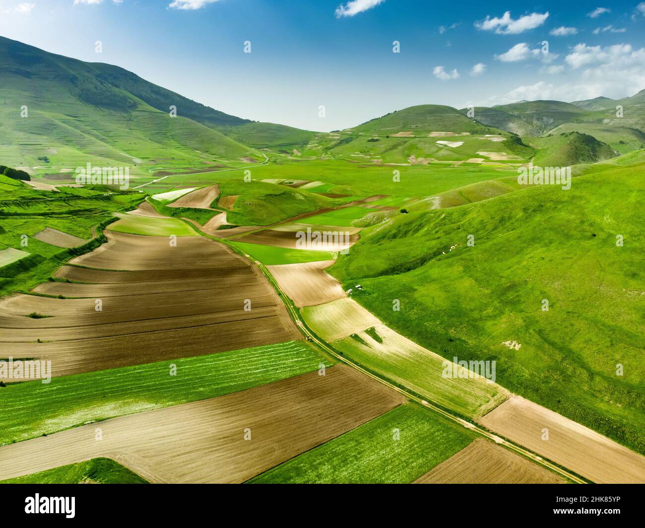 Aerial view of Piano Grande, large karstic plateau of Monti Sibillini ...
