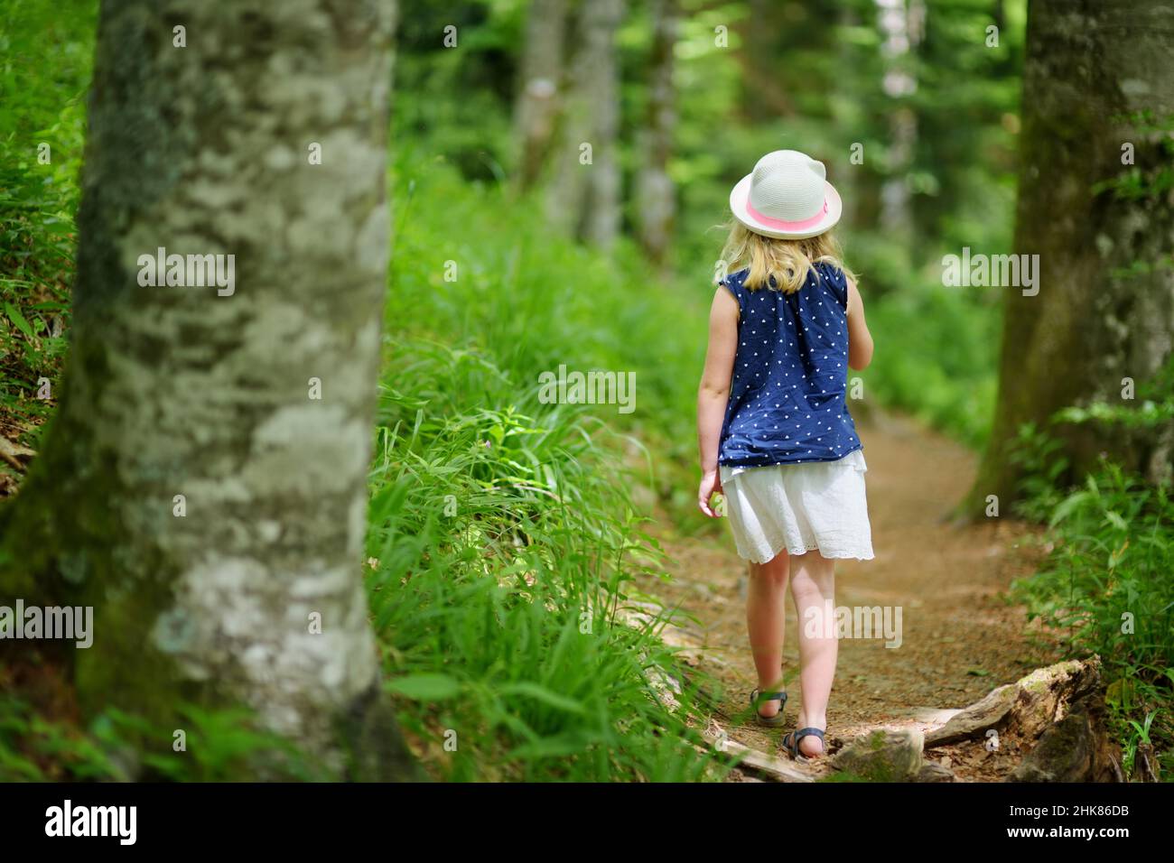 Young girl following a footpath around La Verna Sanctuary, Chiusi della ...