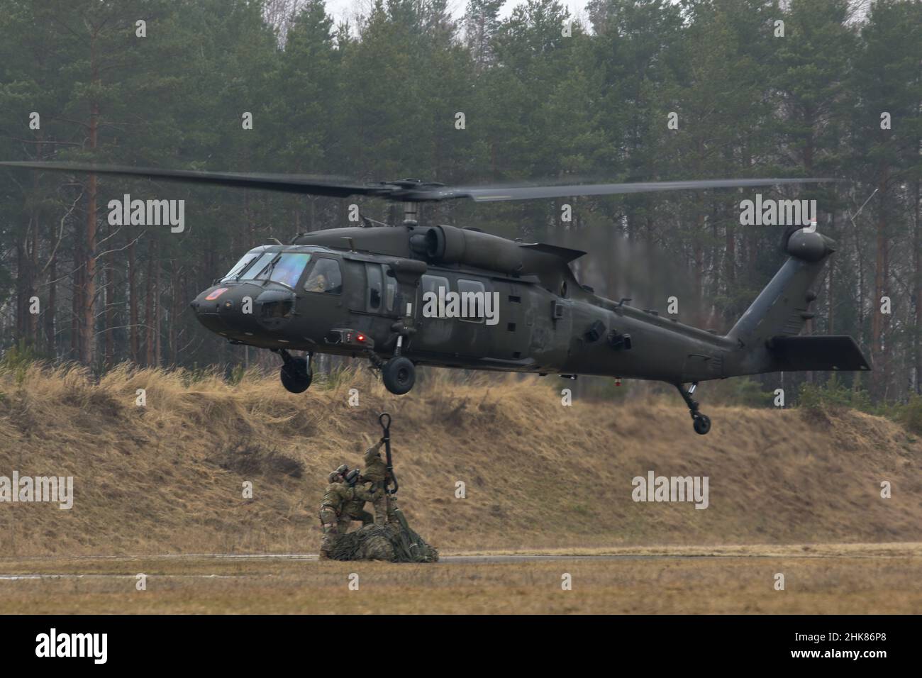Air assault instructors and students conduct sling-load operations with ...