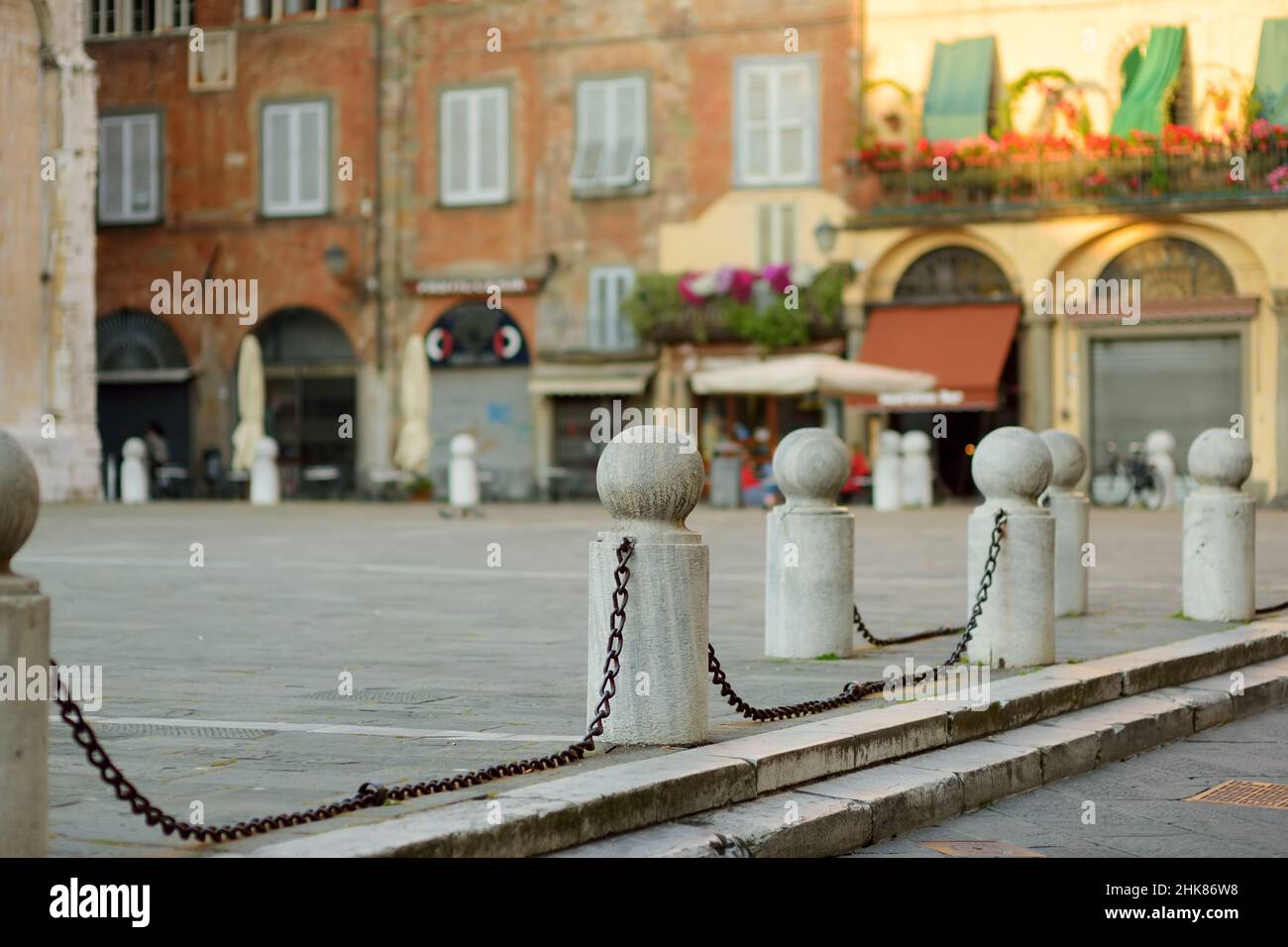 Beautiful medieval streets of Lucca city, known for its intact ...