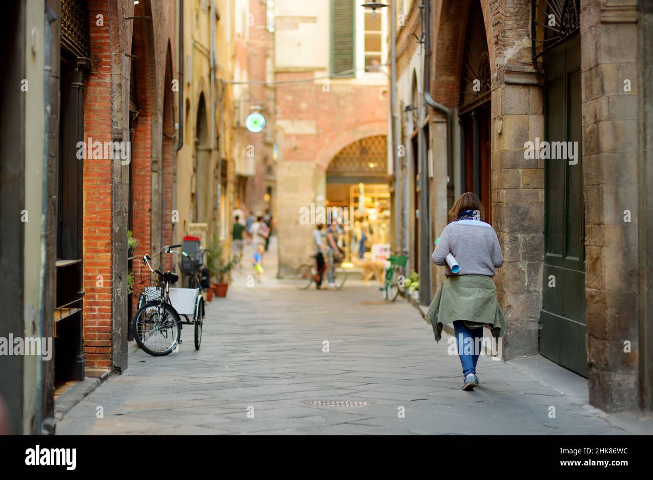 Beautiful medieval streets of Lucca city, known for its intact ...