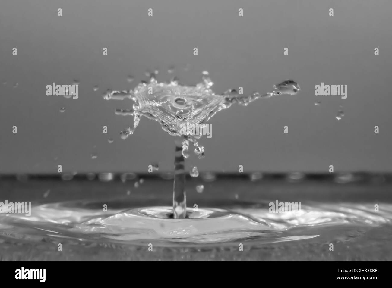 Grayscale of a water splash Stock Photo - Alamy