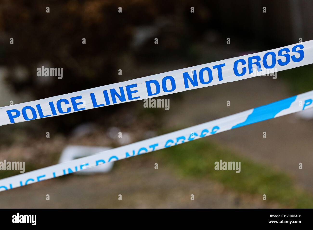 A police tape is attached surrounding a crime scene in London Stock ...