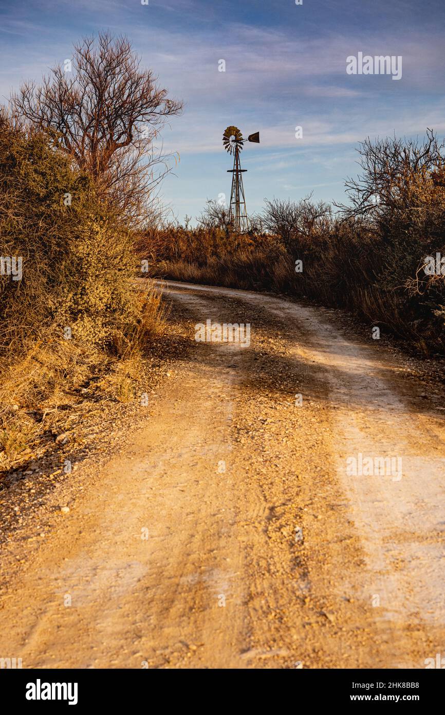 Dirt Road and Western Windmill in Big Bend National Park Stock Photo ...