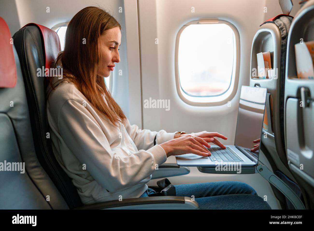 Airplane laptop hi-res stock photography and images - Alamy