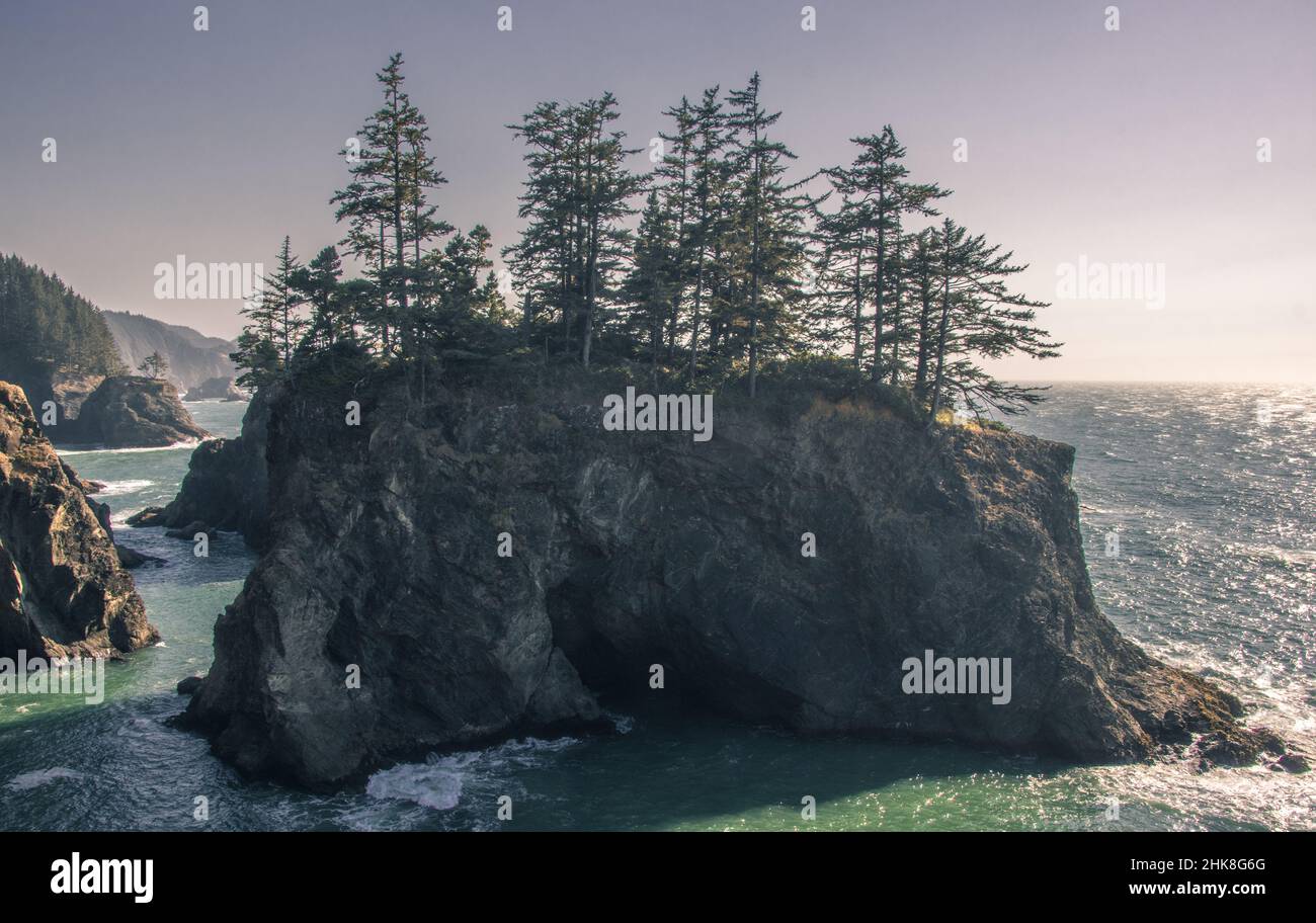 Sunset on natural bridges along the west coast of the Pacific Ocean ...