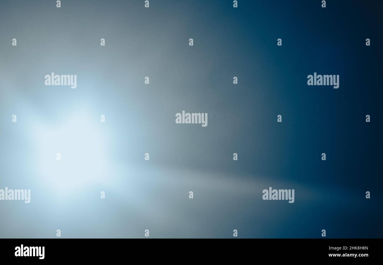 Bright shining white sun beams glaring and radiating out from light to ...