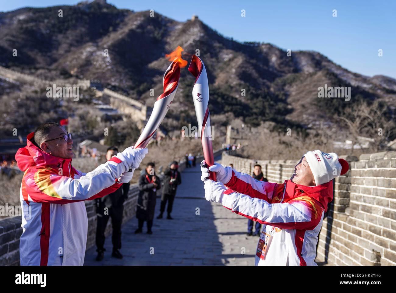 Beijing, China. 3rd Feb, 2022. Torch bearers Han Xiaoyan (L) and Kang Zhi attend the Beijing ...