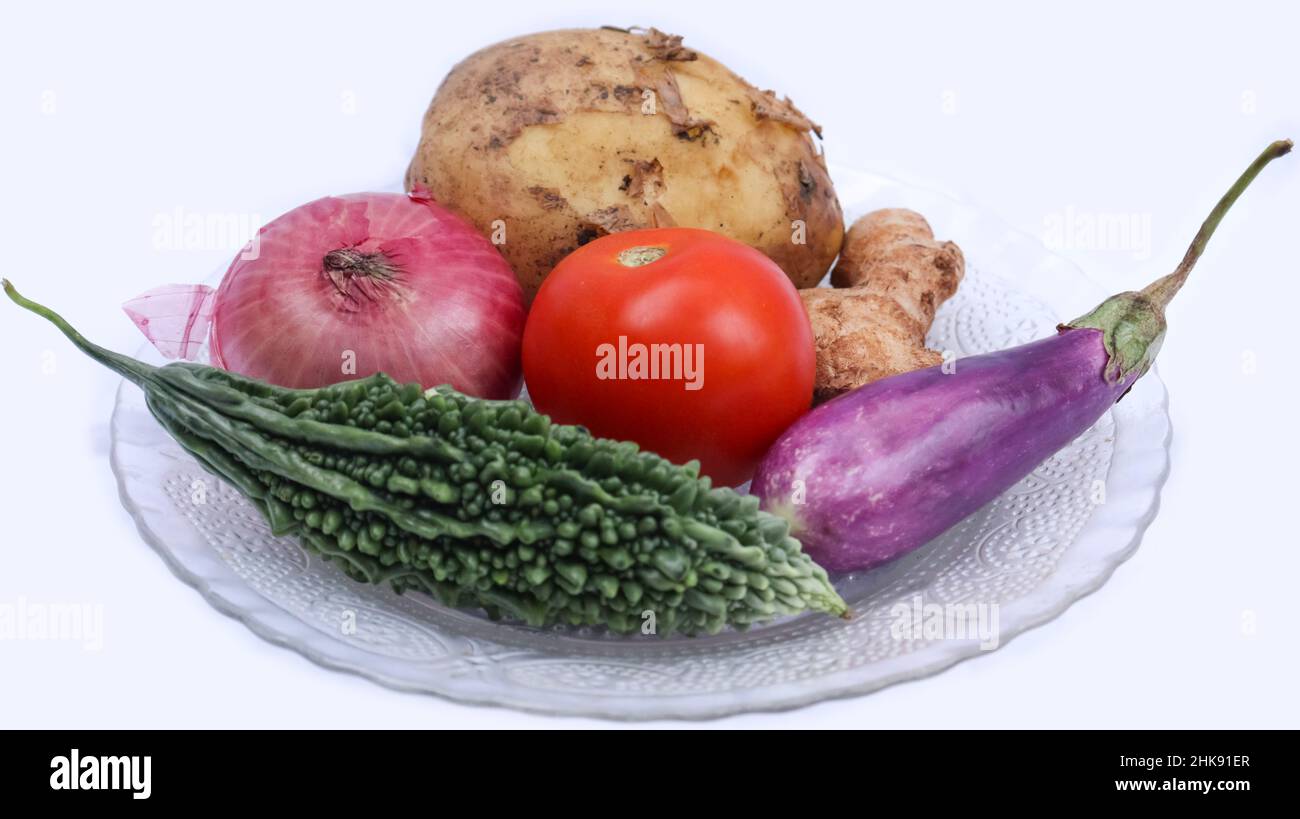 vegetables in the plate. with dim white background Stock Photo - Alamy